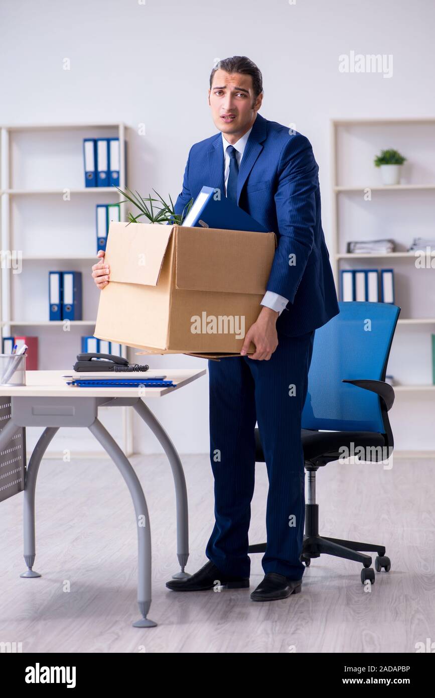 Young employee being made redundant Stock Photo - Alamy