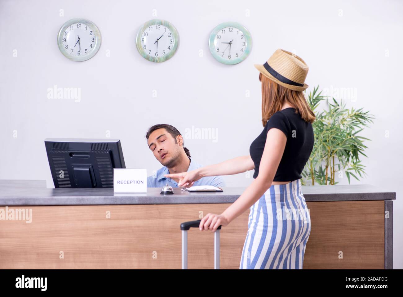 Hotel receptionist funny hi-res stock photography and images - Alamy