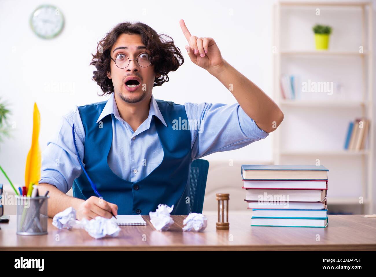 Young writer working on his new work Stock Photo - Alamy