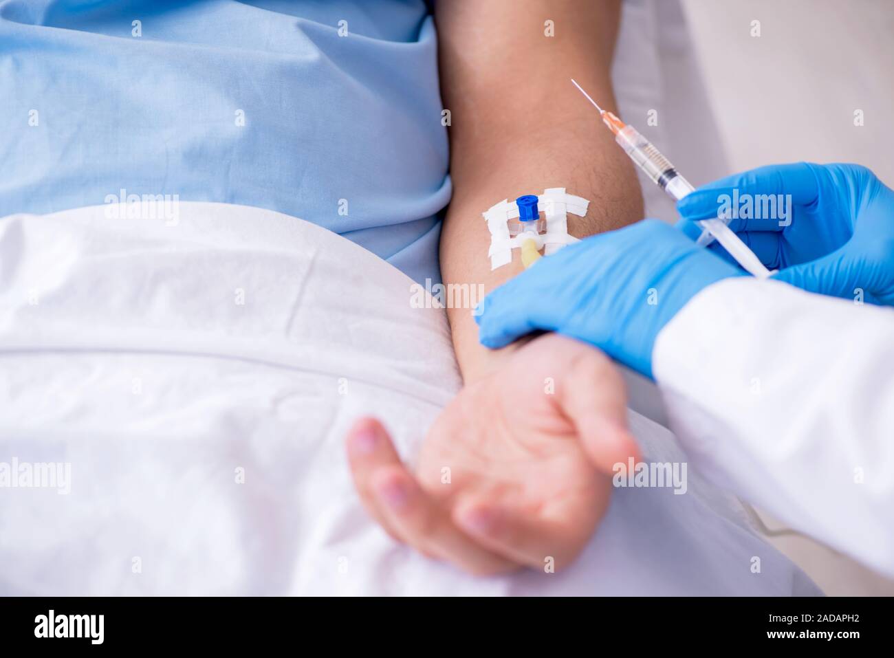 Male patient in blood transfusion concept Stock Photo - Alamy