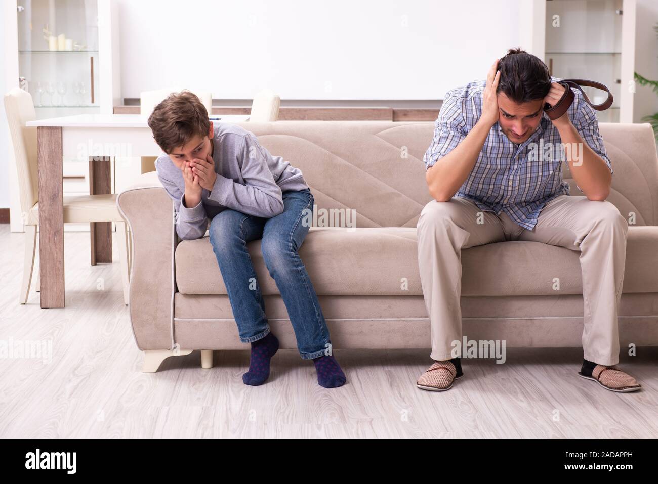 Father beating and punishing his sone Stock Photo - Alamy