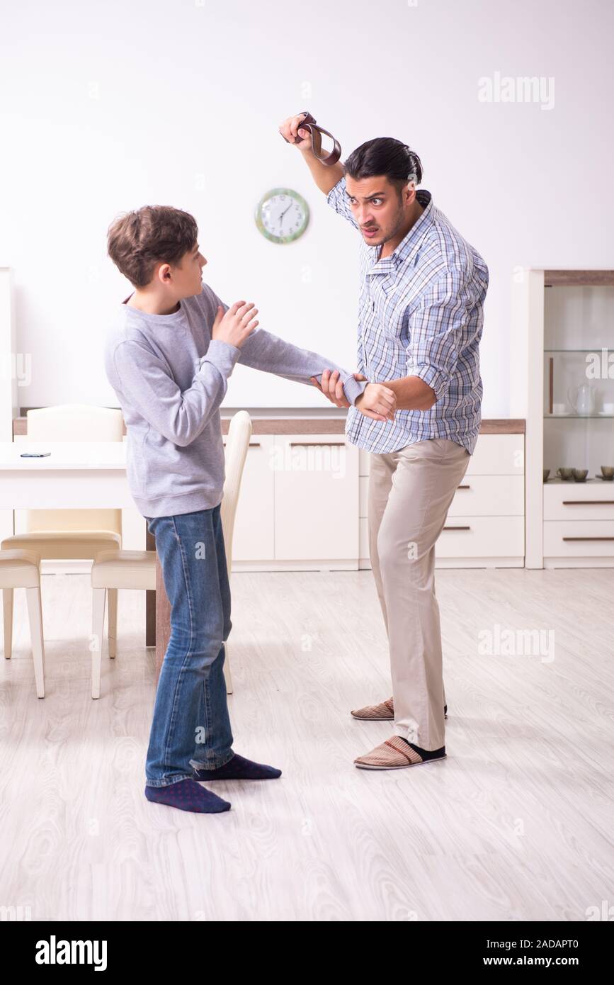 Father beating and punishing his sone Stock Photo - Alamy