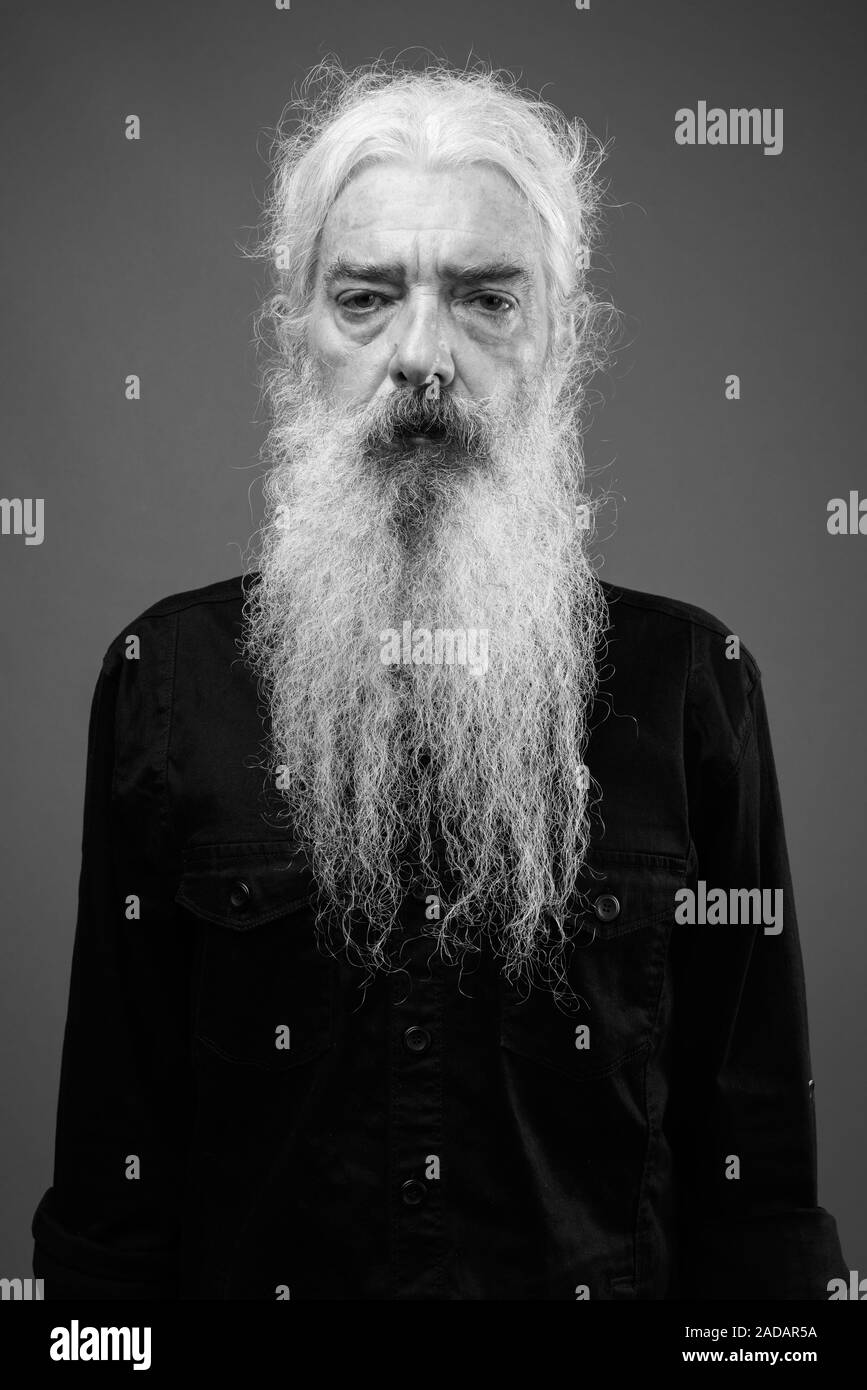 Man in white shirt beard hi-res stock photography and images - Alamy