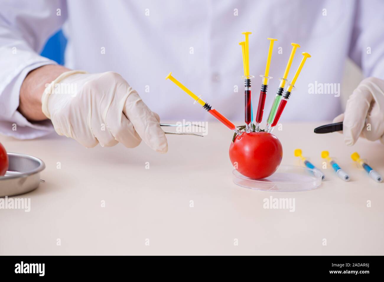 Male nutrition expert testing food products in lab Stock Photo - Alamy
