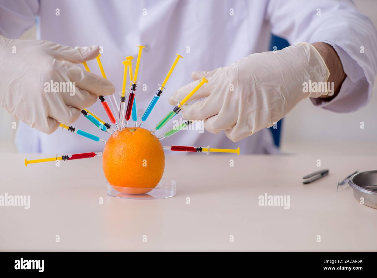 Male nutrition expert testing food products in lab Stock Photo - Alamy