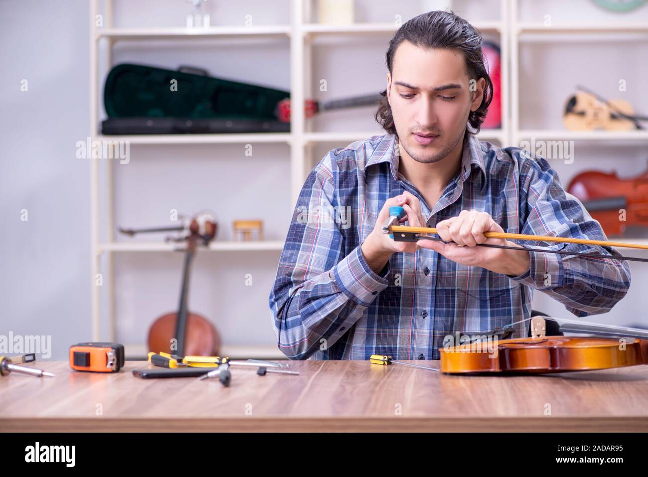 Repairing violin hi-res stock photography and images - Alamy