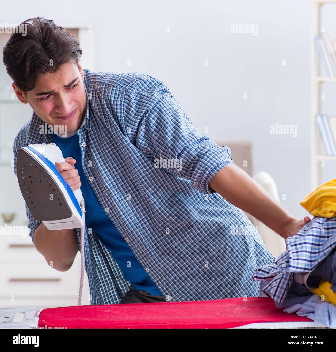 Doing the ironing hi-res stock photography and images - Alamy