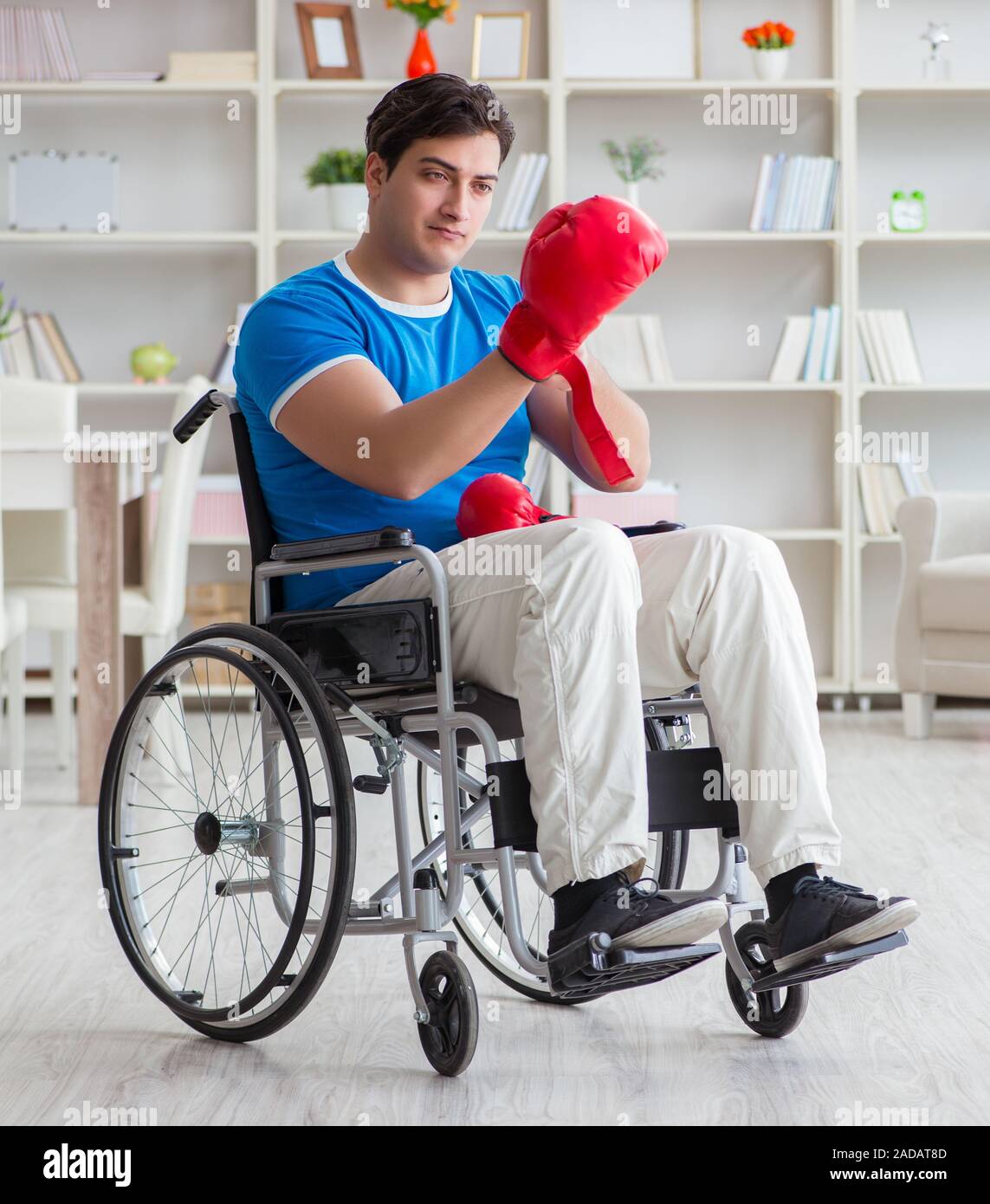 Wheelchair and boxing gloves hi-res stock photography and images - Alamy