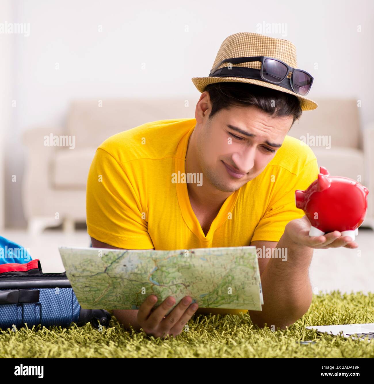 Man planning his vacation trip with map Stock Photo - Alamy