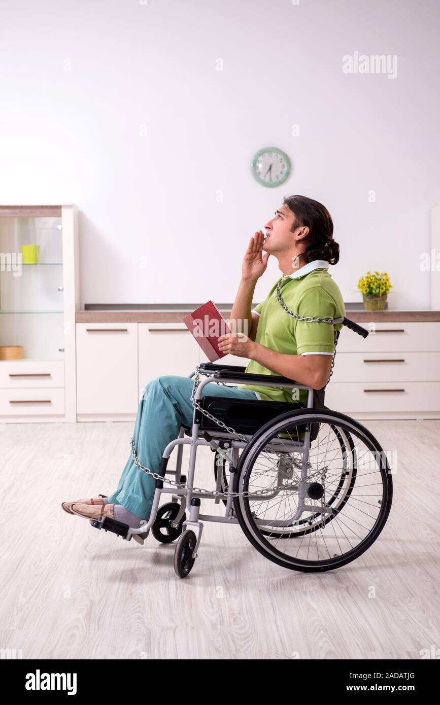 Restrained wheelchair hi-res stock photography and images - Alamy