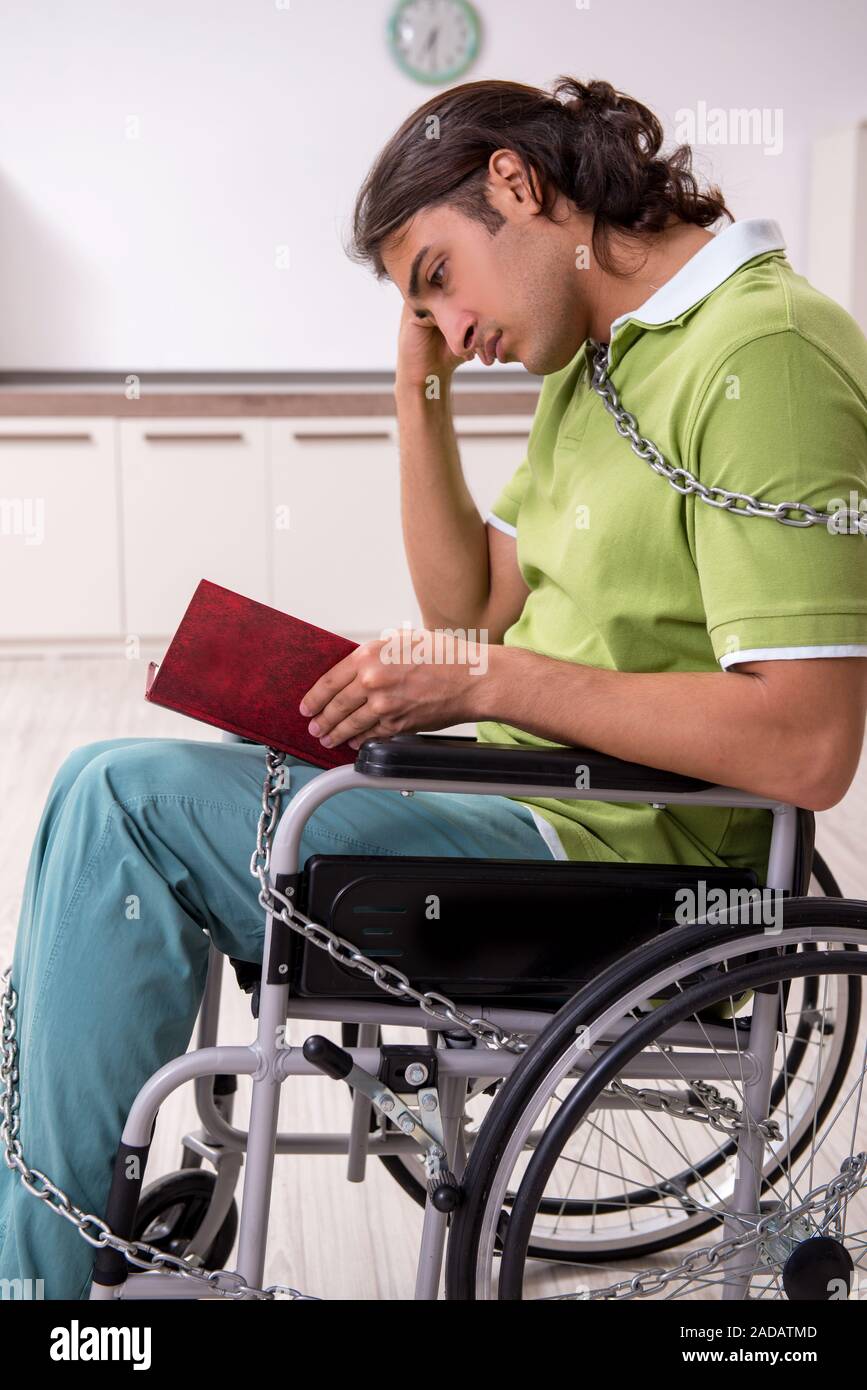 Restrained wheelchair hi-res stock photography and images - Alamy