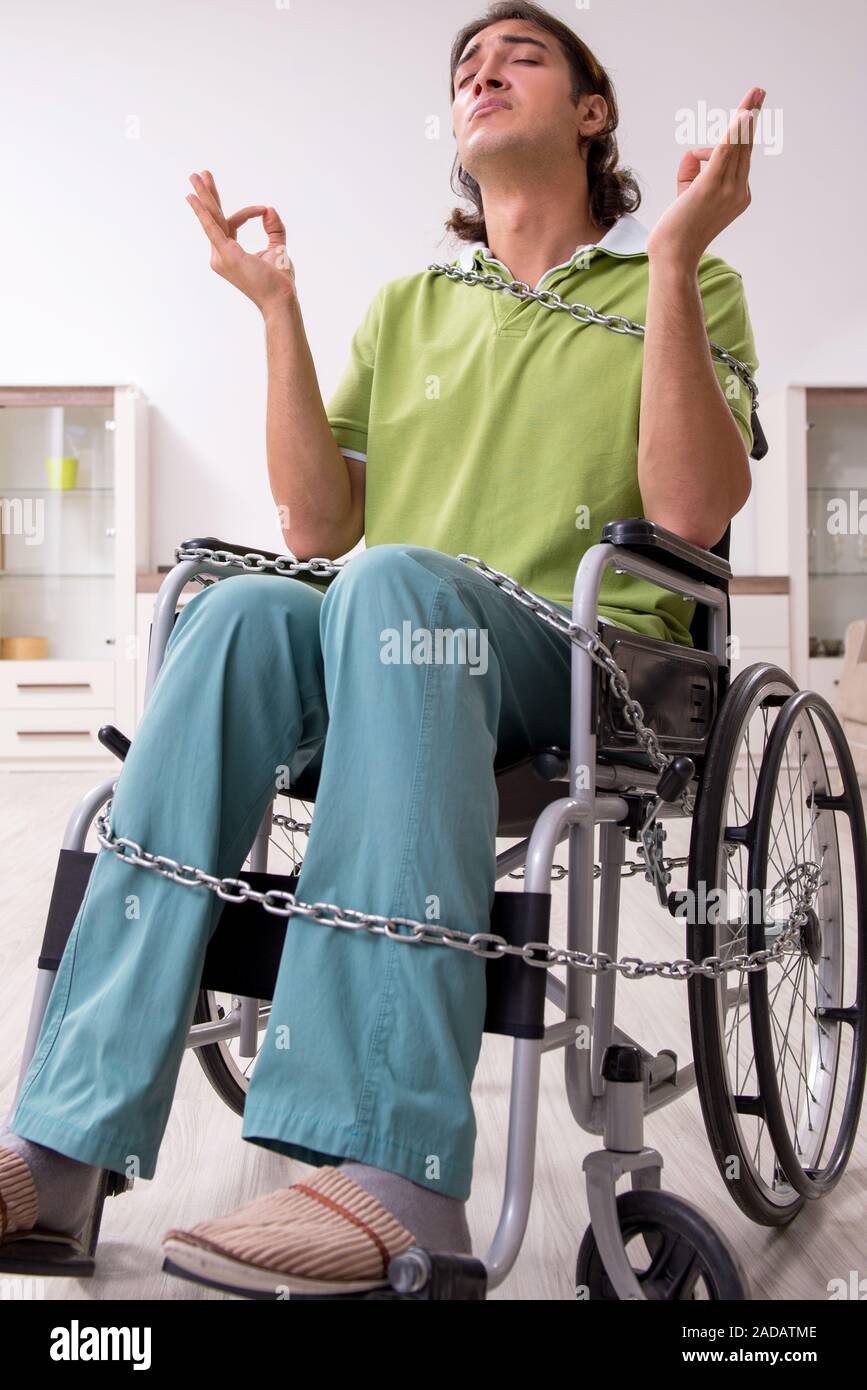 Restrained wheelchair hi-res stock photography and images - Alamy
