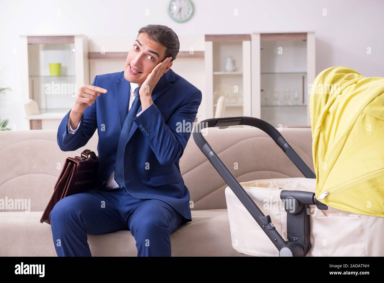 Looking after baby hi-res stock photography and images - Alamy