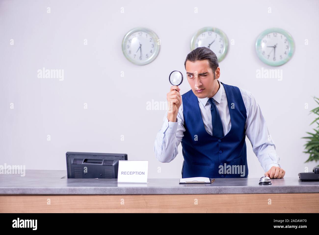 Hotel receptionist funny hi-res stock photography and images - Alamy