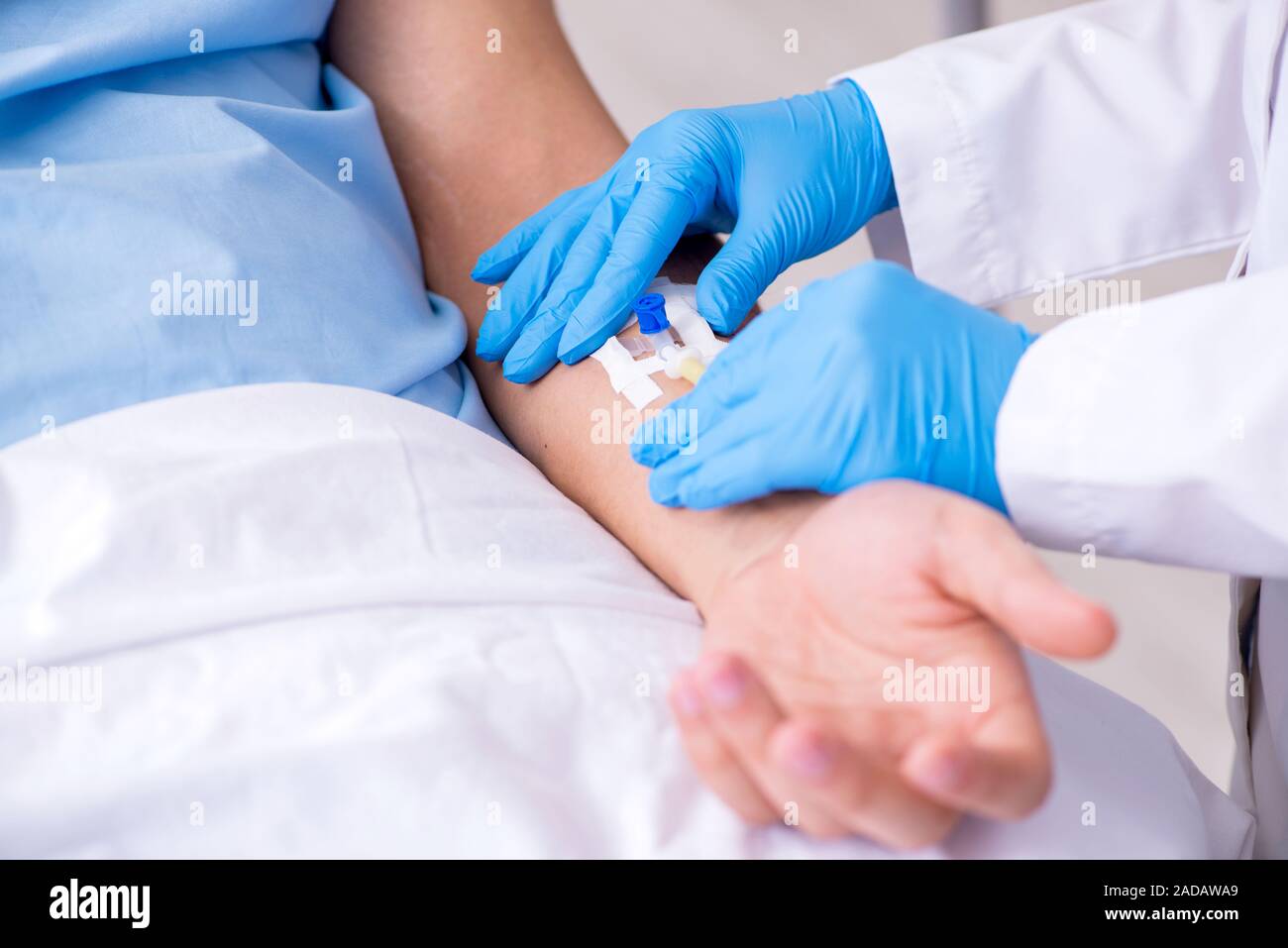 Male patient in blood transfusion concept hi-res stock photography and ...