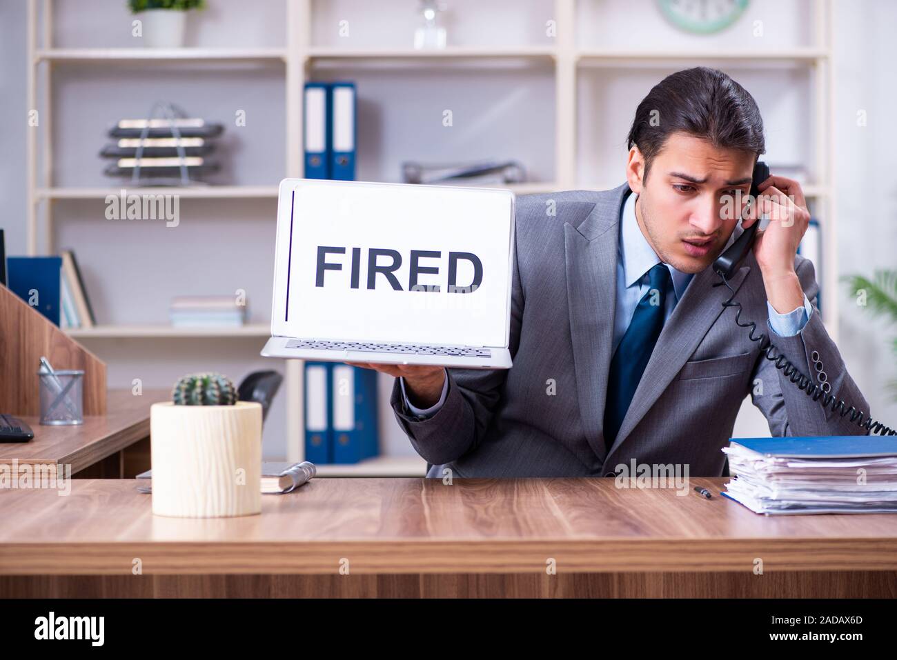 Young employee being fired hi-res stock photography and images - Alamy