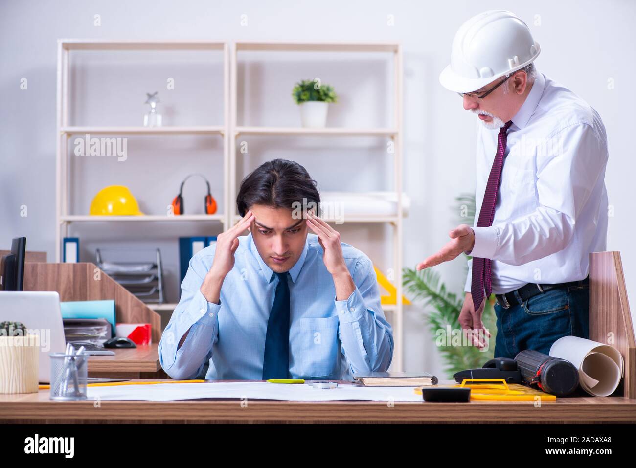 Two architects working on the project Stock Photo - Alamy