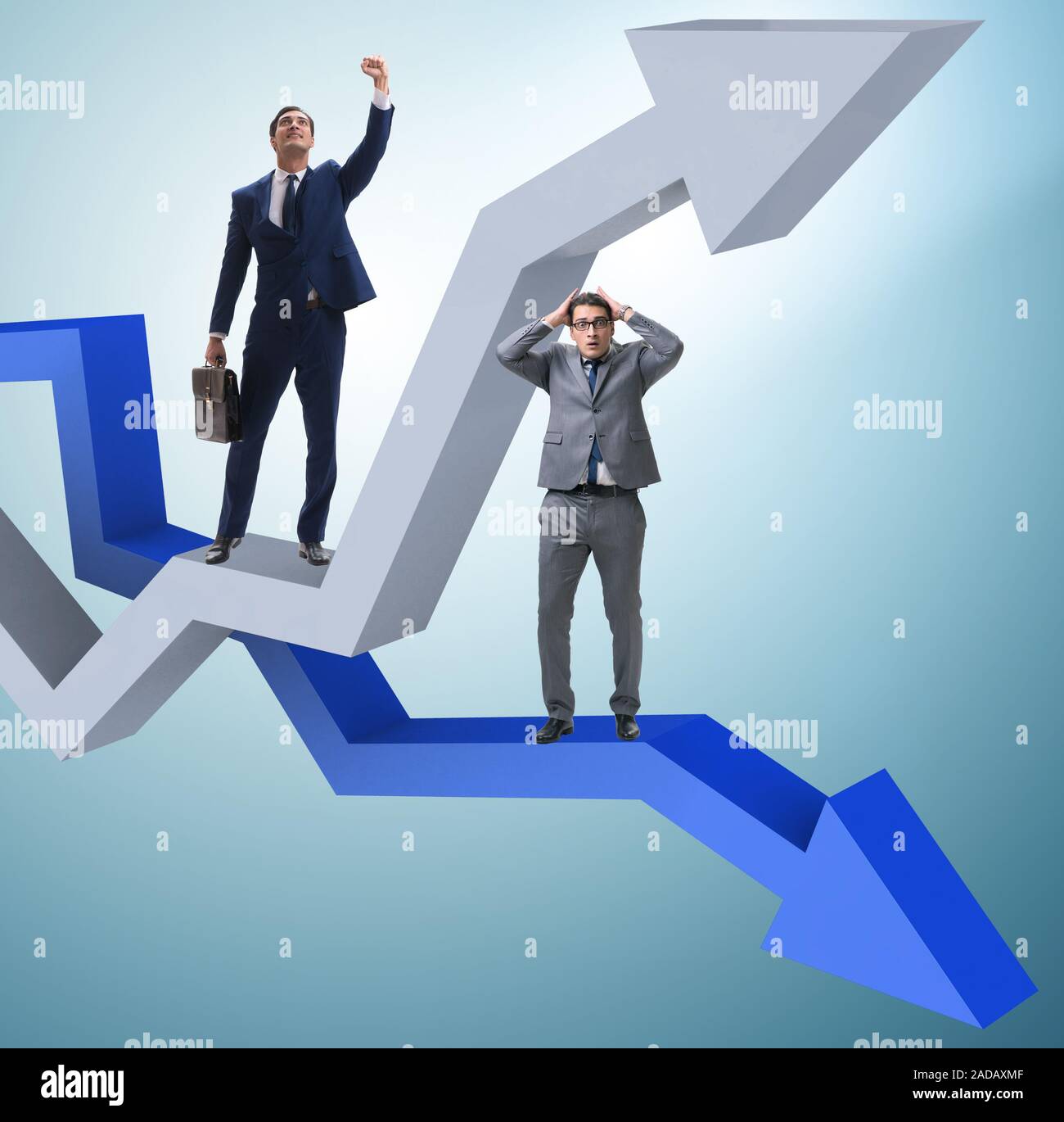 Businessman with charts of growth and decline Stock Photo - Alamy