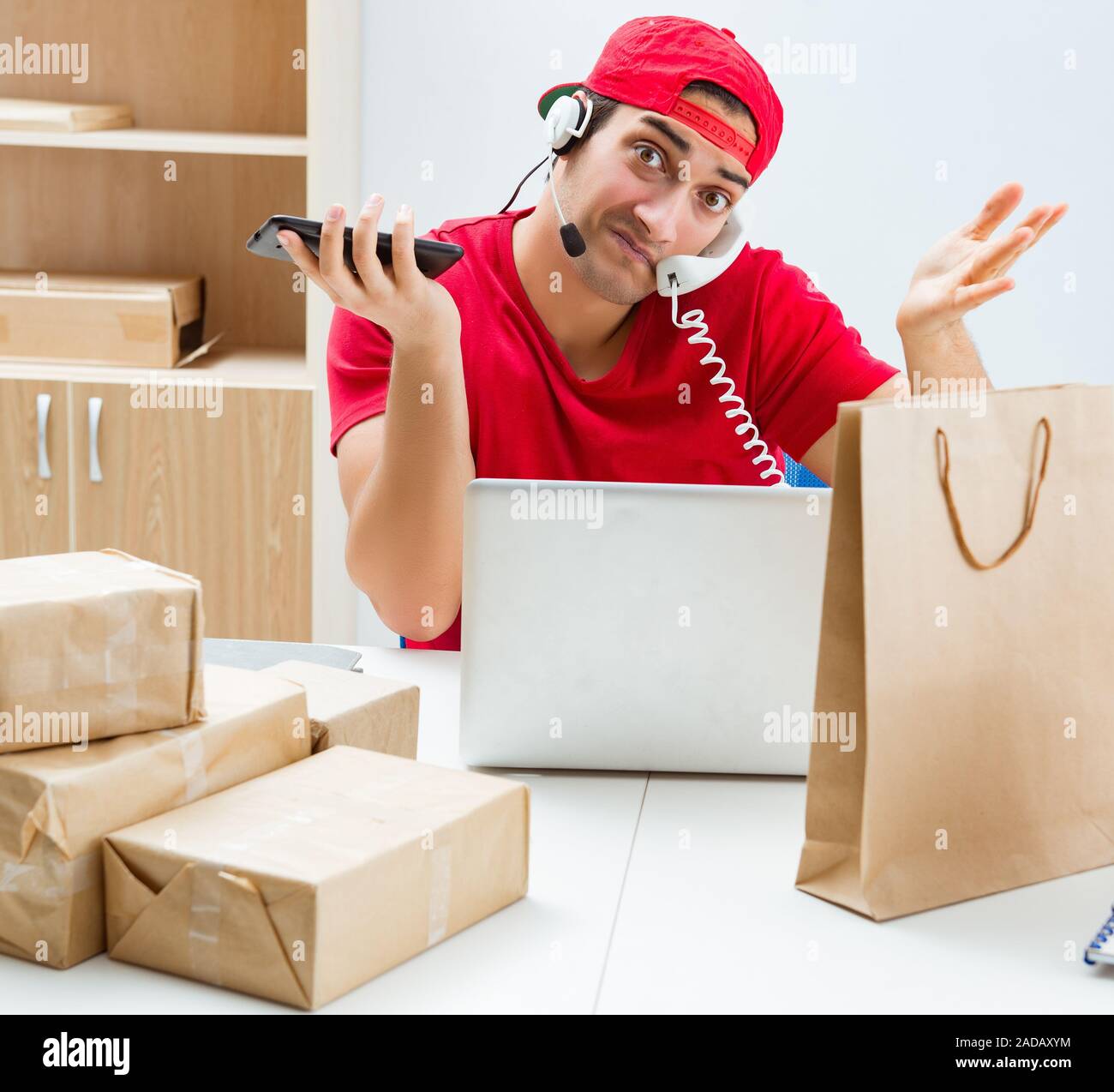 Call center worker at parcel distribution center in post office Stock ...