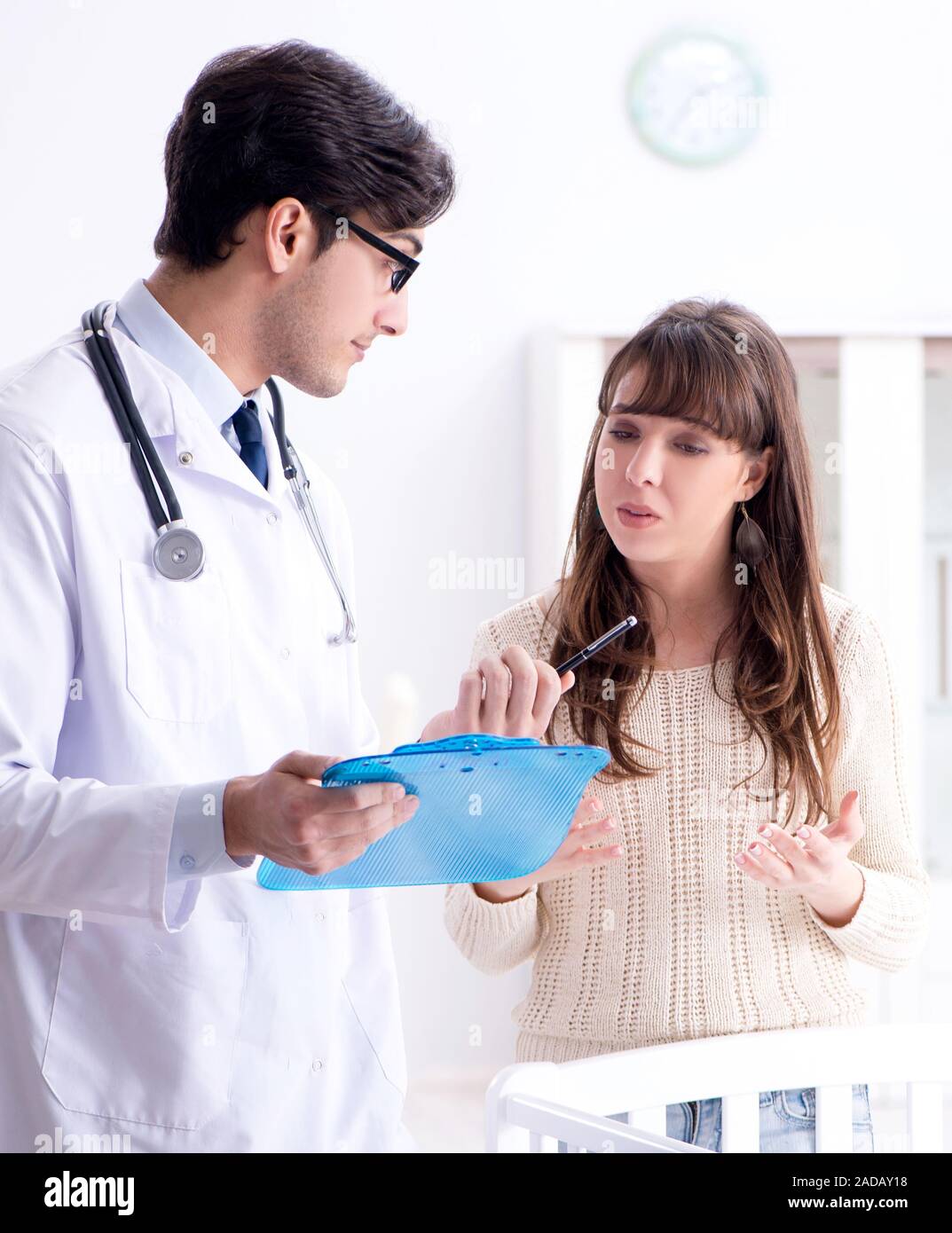 Doctor writing child diagnostic hi-res stock photography and images - Alamy