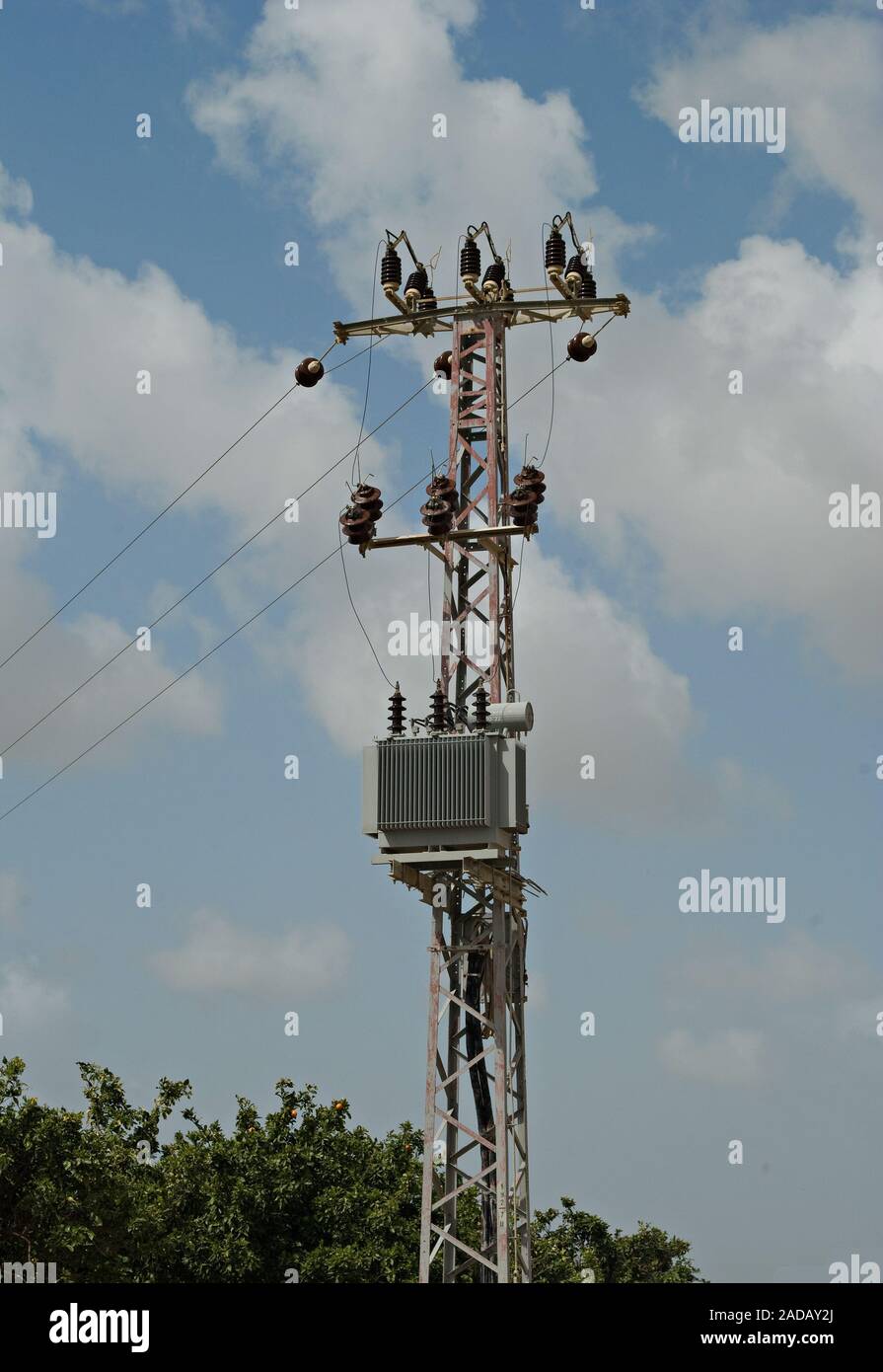 Overhead power line and a lowering transformer Stock Photo - Alamy