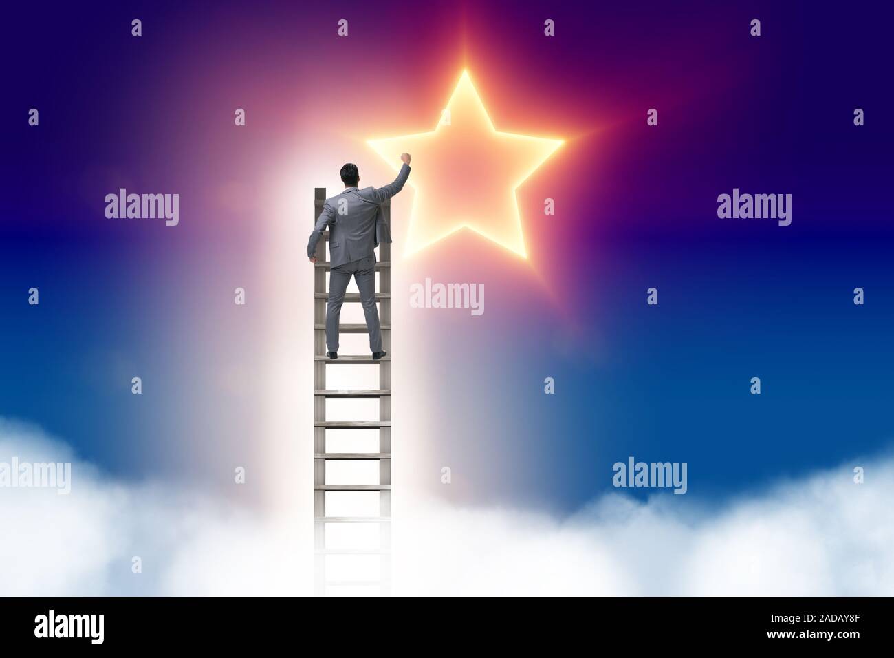 Businessman reaching out for stars Stock Photo - Alamy