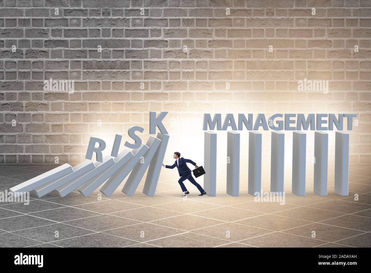 Businessman in risk management concept Stock Photo - Alamy
