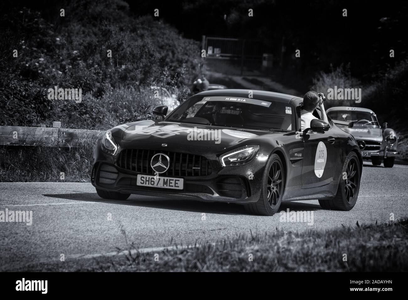 mercedes AMG GT on an old racing car in rally Mille Miglia 2018 the ...