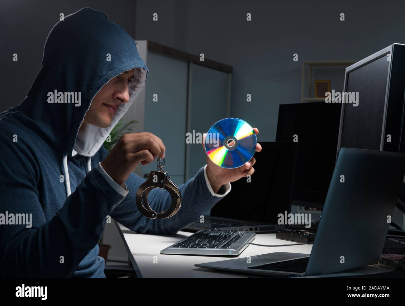 Hacker hacking computer at night Stock Photo - Alamy