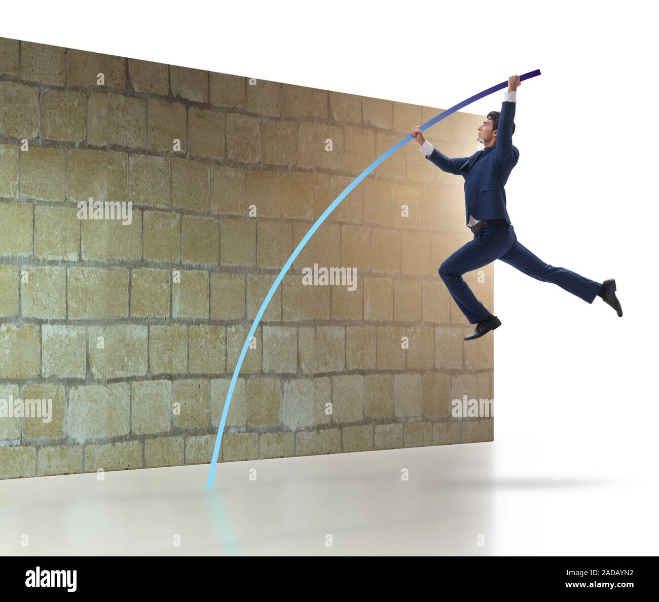 Man jumping over stone wall hi-res stock photography and images - Alamy