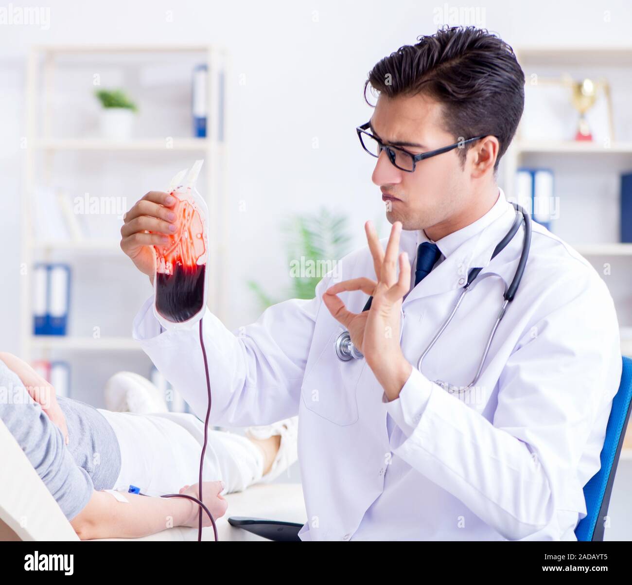 Patient getting blood transfusion in hospital clinic Stock Photo - Alamy