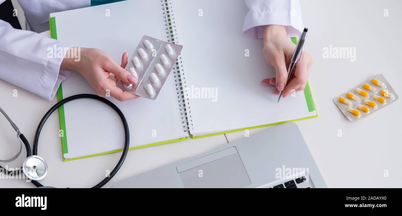 Hand writing medical prescription in computer Stock Photo - Alamy