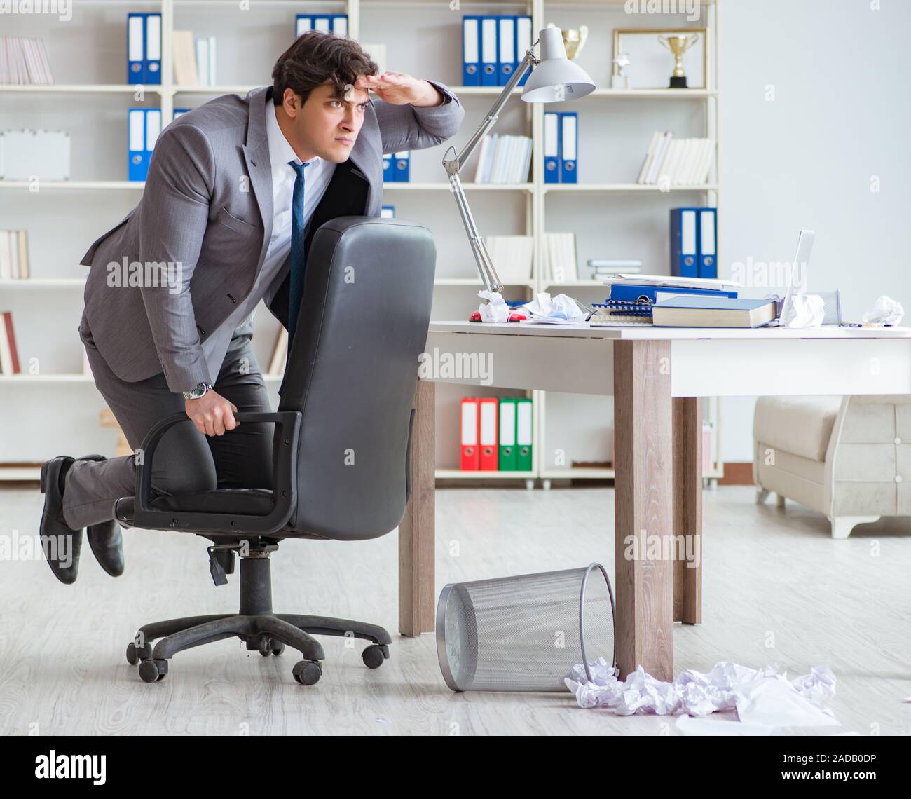 Businessman having fun taking a break in the office at work Stock Photo ...
