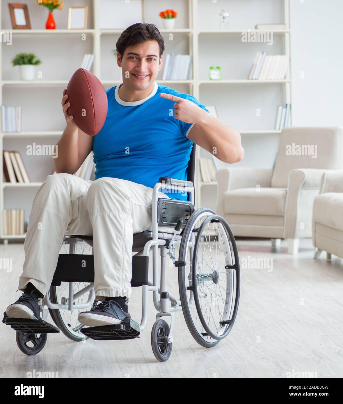 Young man american football player recovering on wheelchair Stock Photo ...