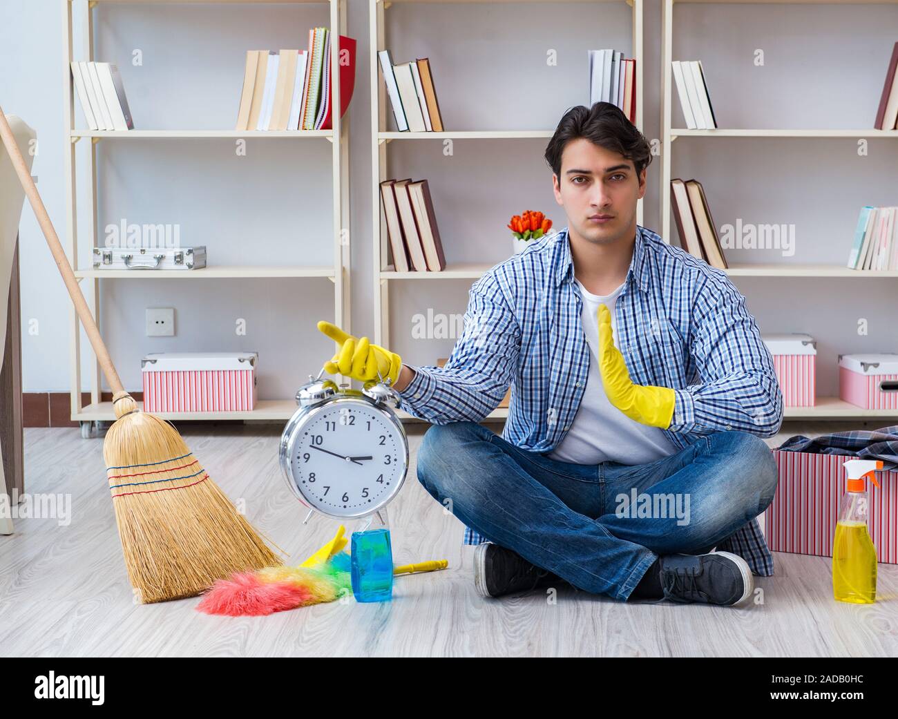 Man cleaning clock hi-res stock photography and images - Alamy