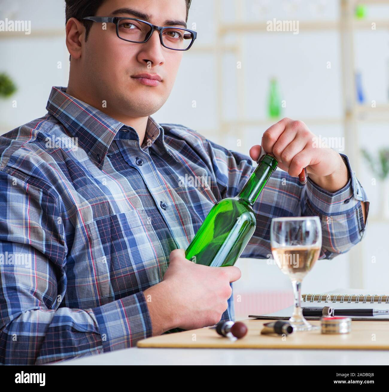 Professional sommelier tasting red wine Stock Photo - Alamy