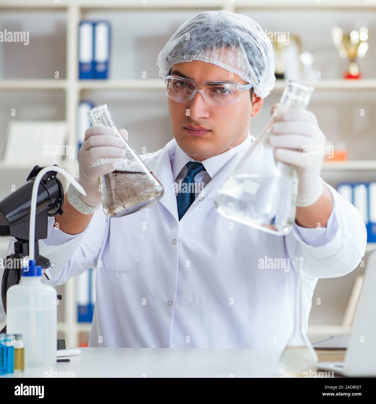 Young researcher scientist doing a water test contamination expe Stock ...