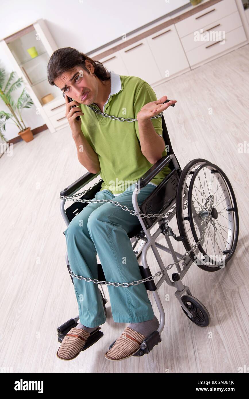 Restrained wheelchair hi-res stock photography and images - Alamy