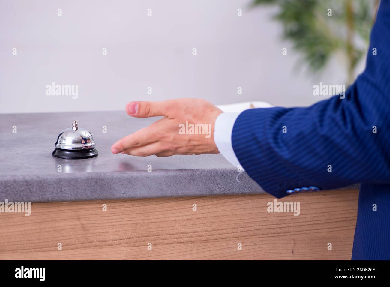Hotel reception bell at the counter Stock Photo - Alamy