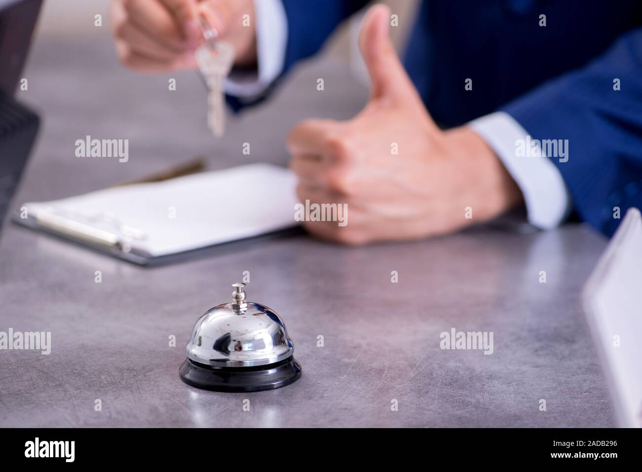 Hotel reception bell at the counter Stock Photo - Alamy