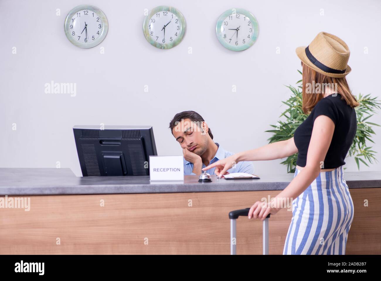 Hotel receptionist funny hi-res stock photography and images - Alamy