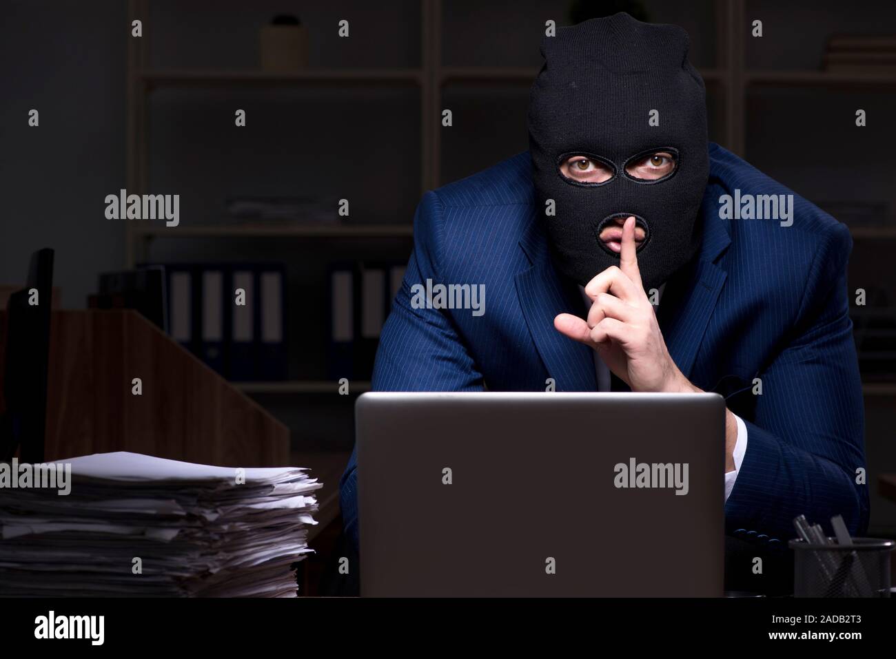 Male employee stealing information in the office night time Stock Photo ...