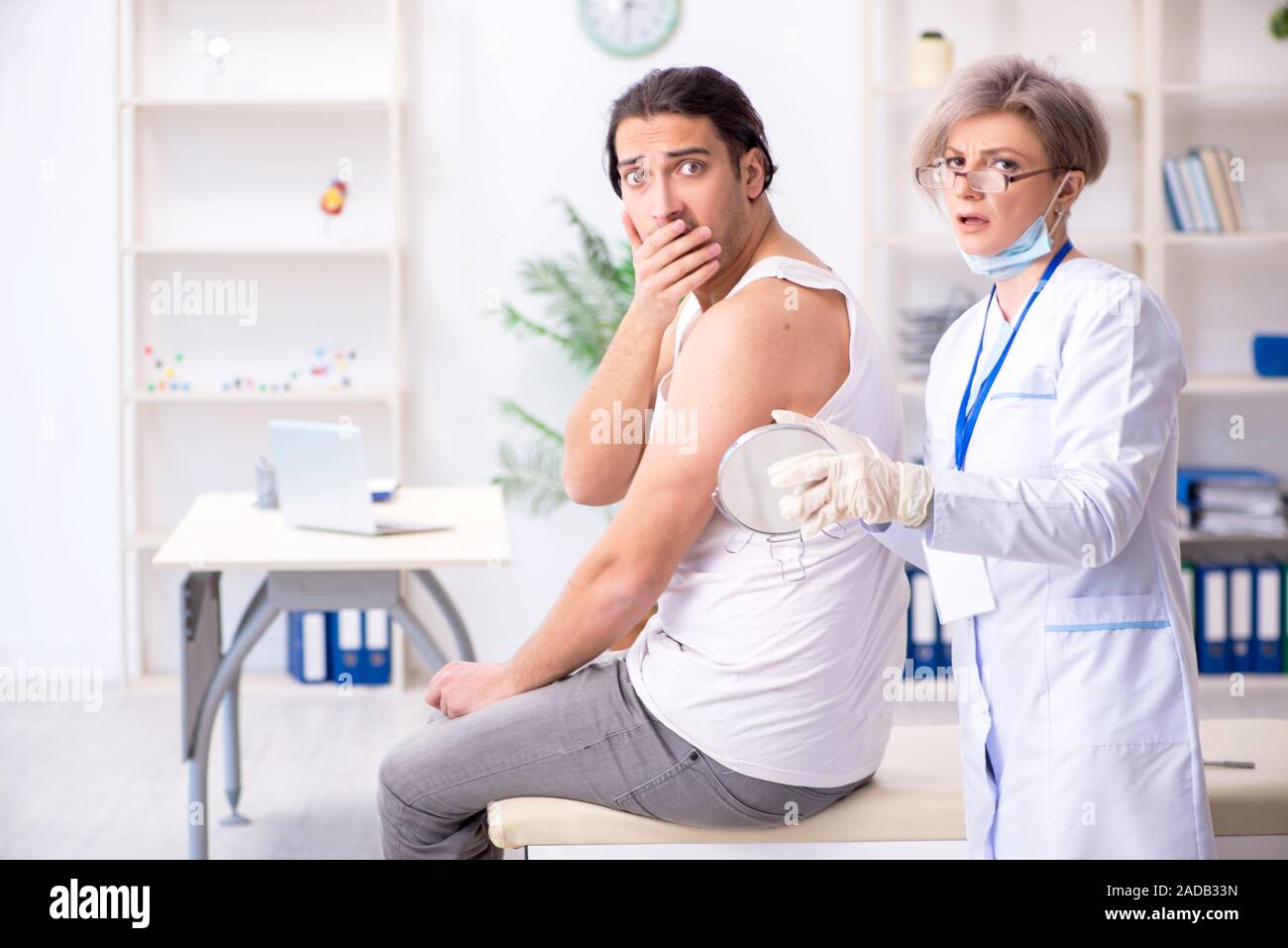 Man body checking mirror hi-res stock photography and images - Alamy