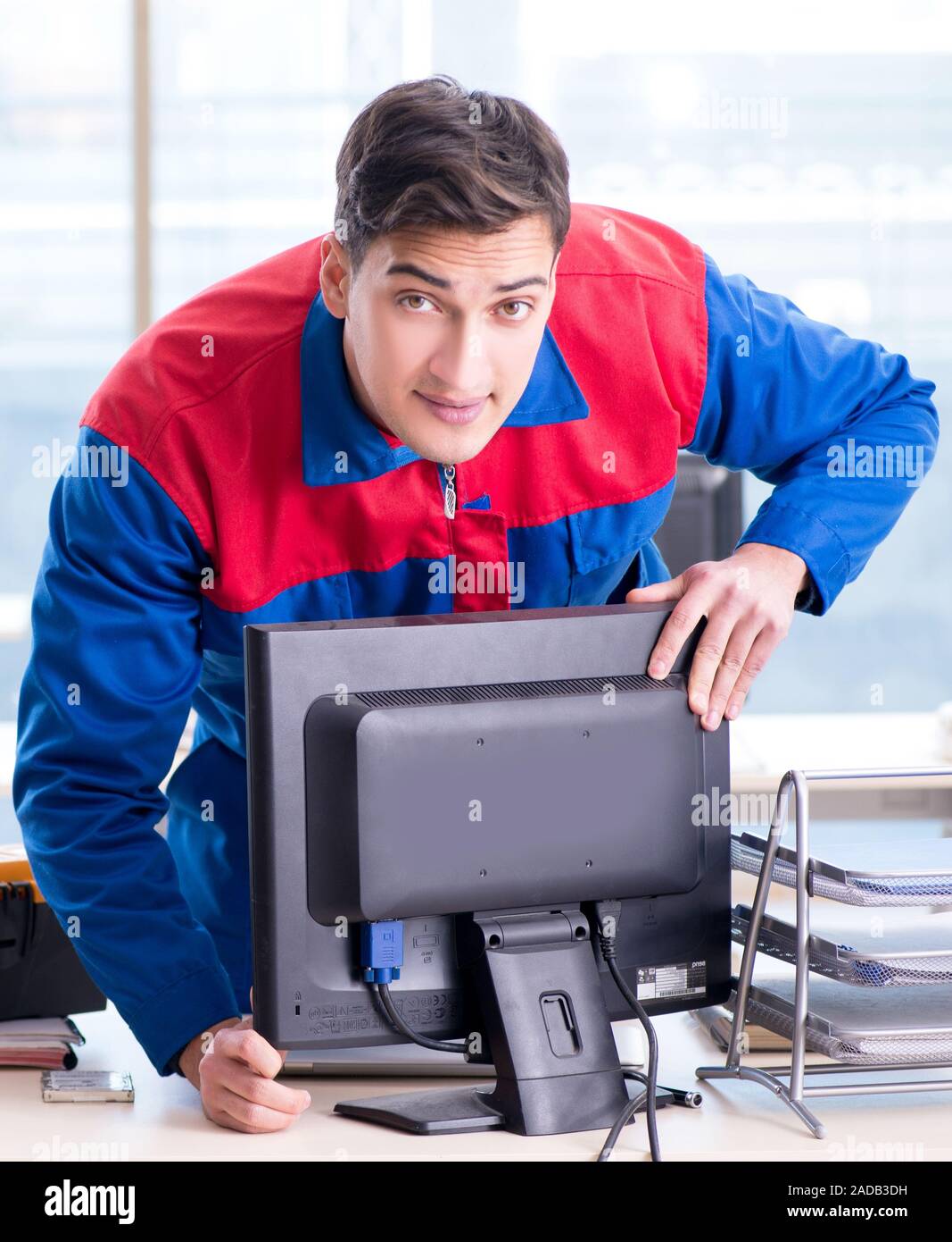 Computer repairman specialist repairing computer desktop Stock Photo ...