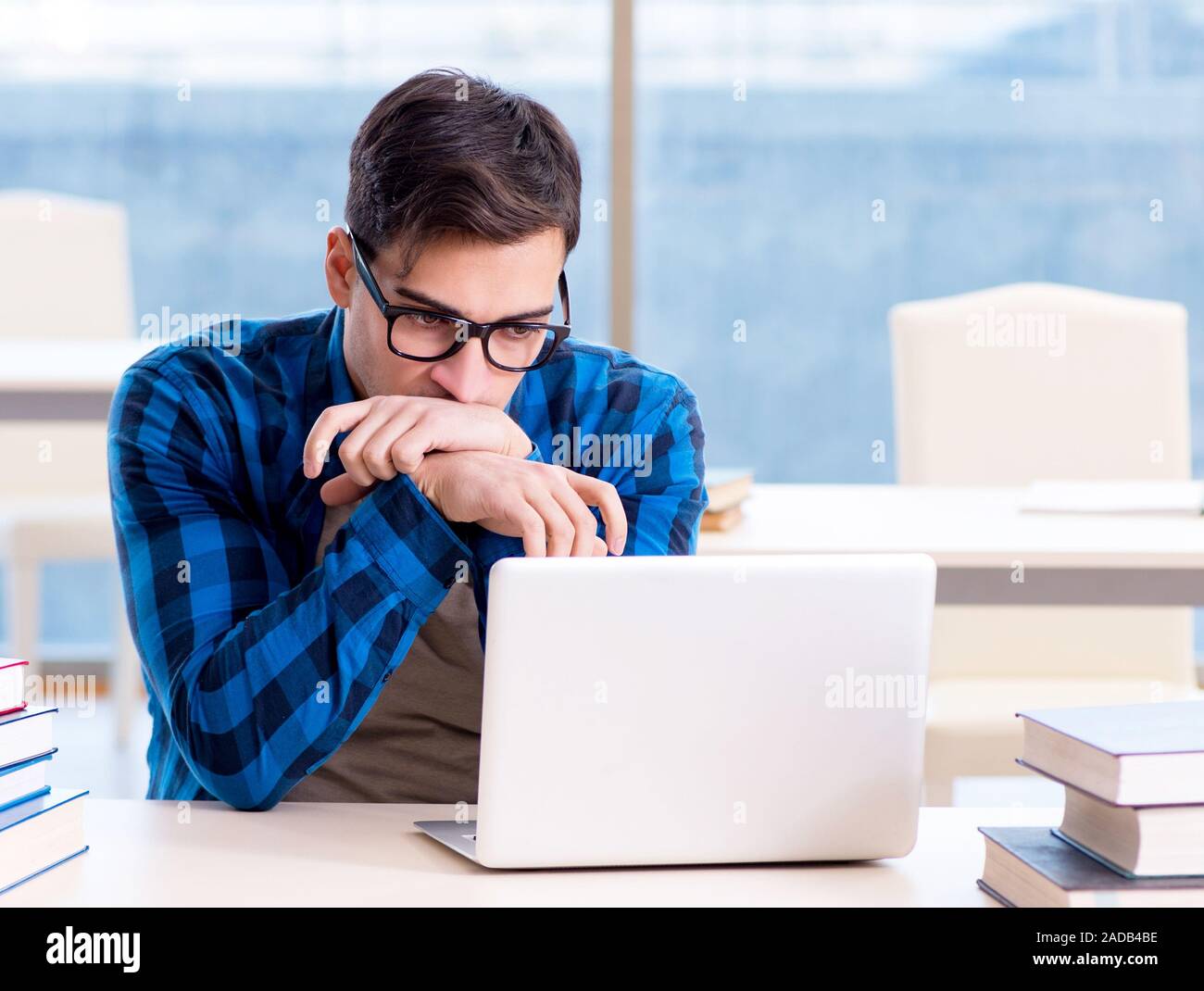 Student in telelearning distance learning concept reading in lib Stock ...