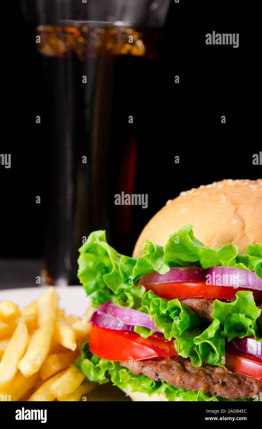Burger served in bun in nutrition fast food concept Stock Photo - Alamy