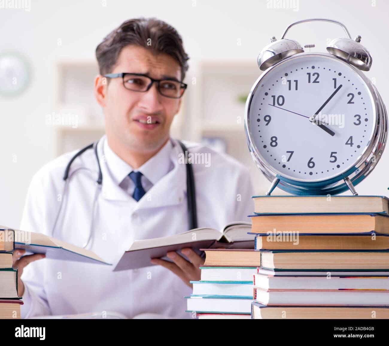 The medical student running out of time for exams Stock Photo - Alamy