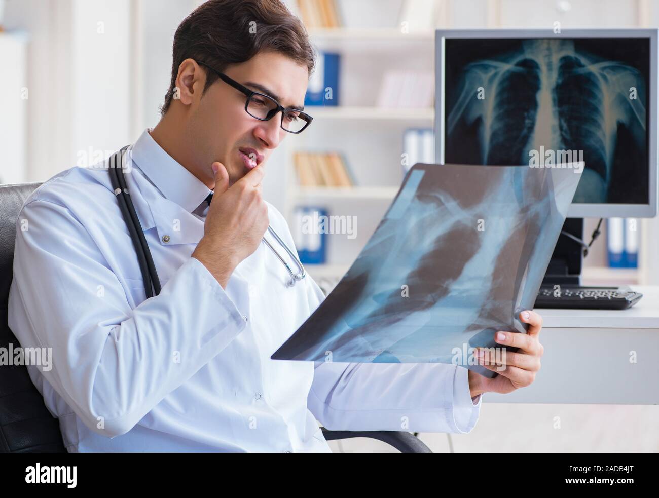 The doctor radiologist looking at x-ray images Stock Photo - Alamy