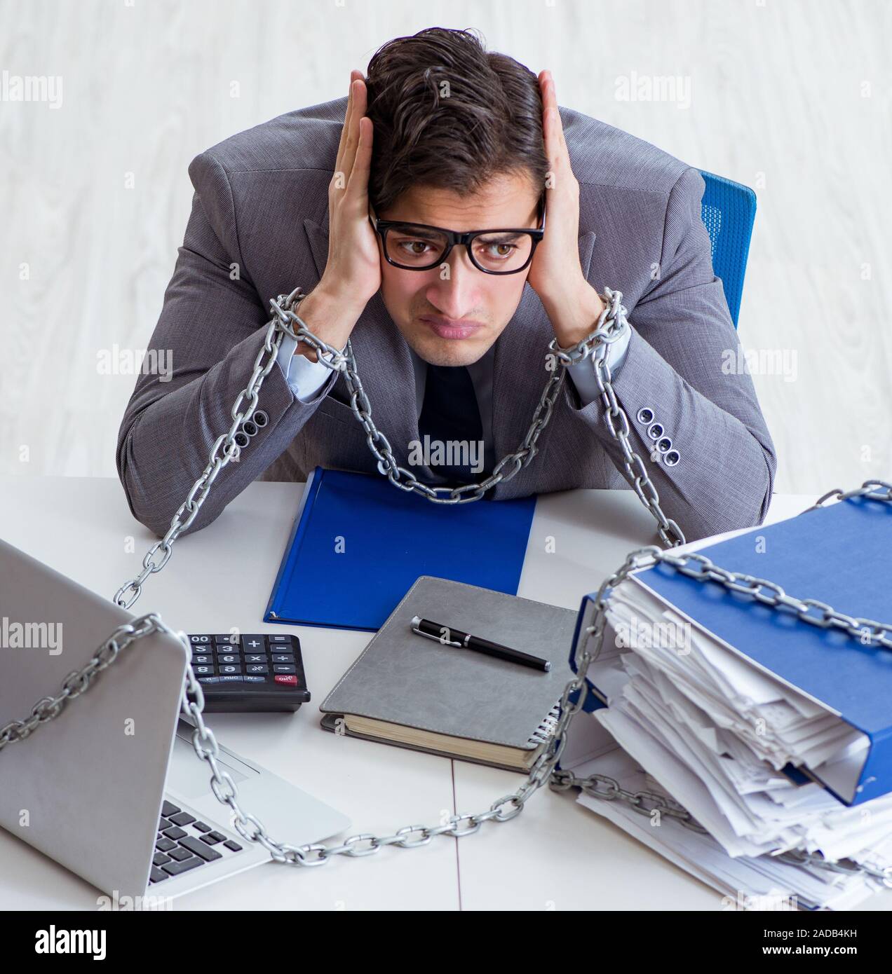 Chained to desk hi-res stock photography and images - Alamy