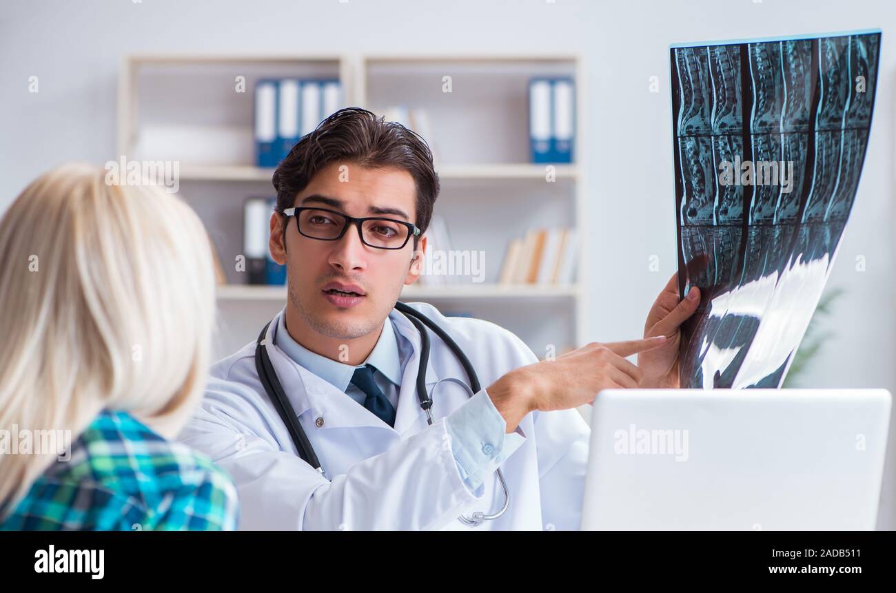 The doctor examining x-ray images of patient Stock Photo - Alamy
